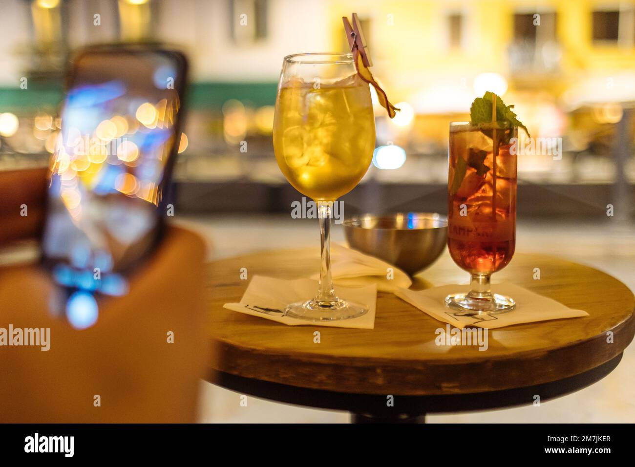 Phone Photographing a Couple of Cocktails at Navigli District at night ...