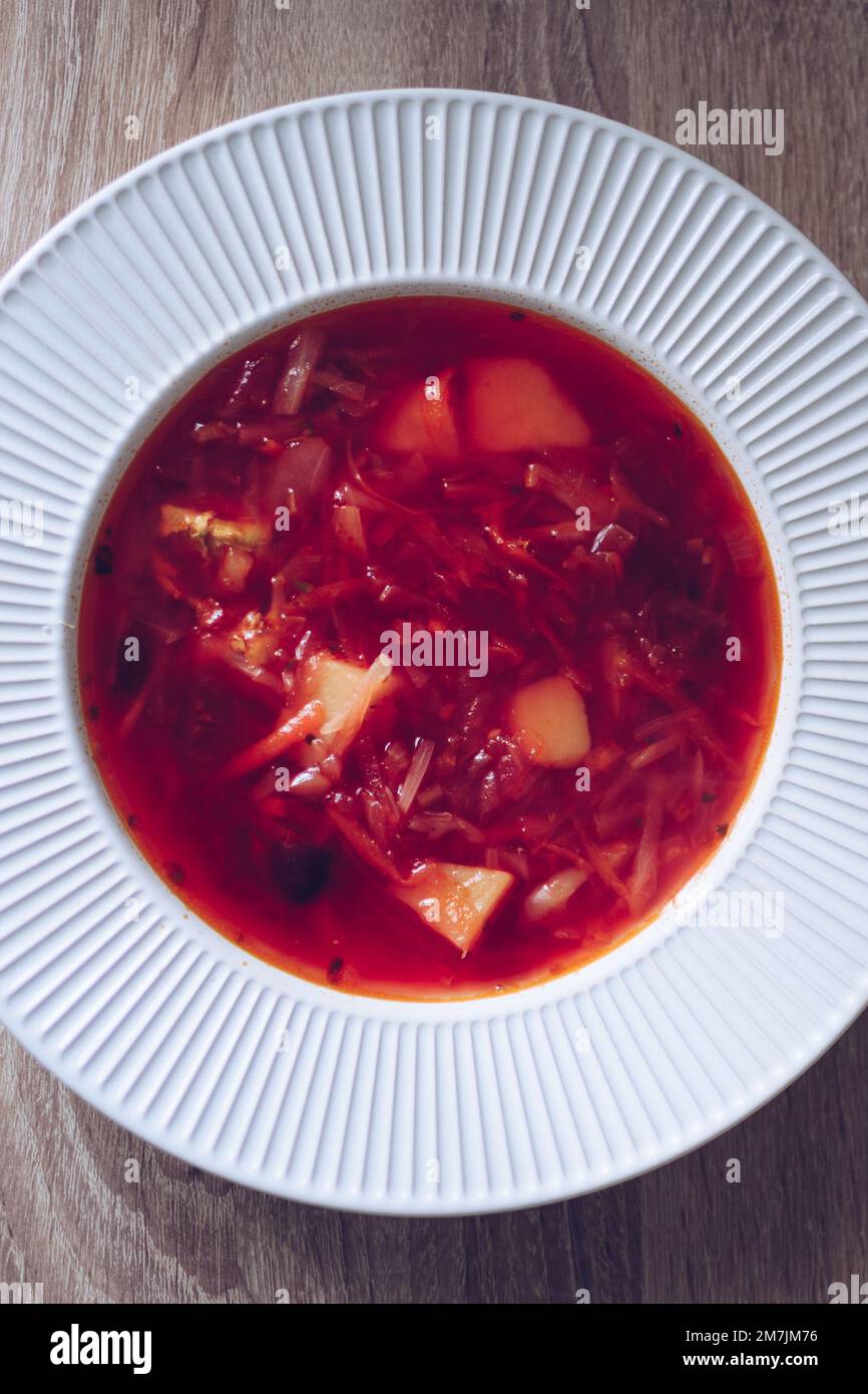 Traditional Ukrainian borscht. Plate of red beet root soup borsch ...