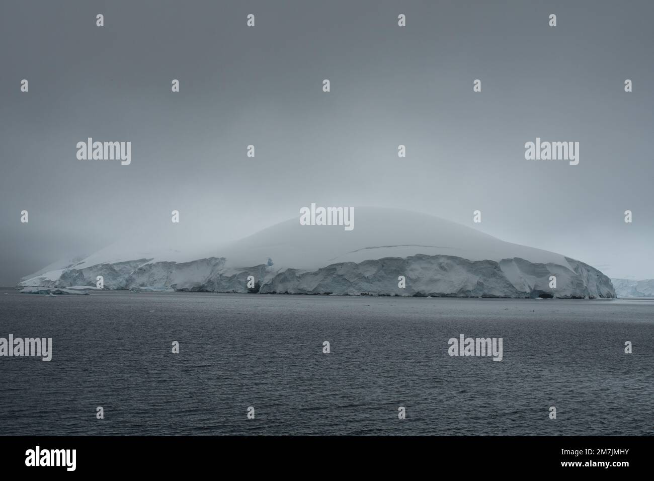 An aerial view of sea with snow covered beach in Antarctica Stock Photo ...