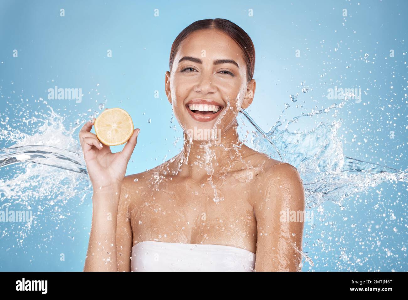 Lemon, skincare and woman in water splash for beauty, cosmetics and ...