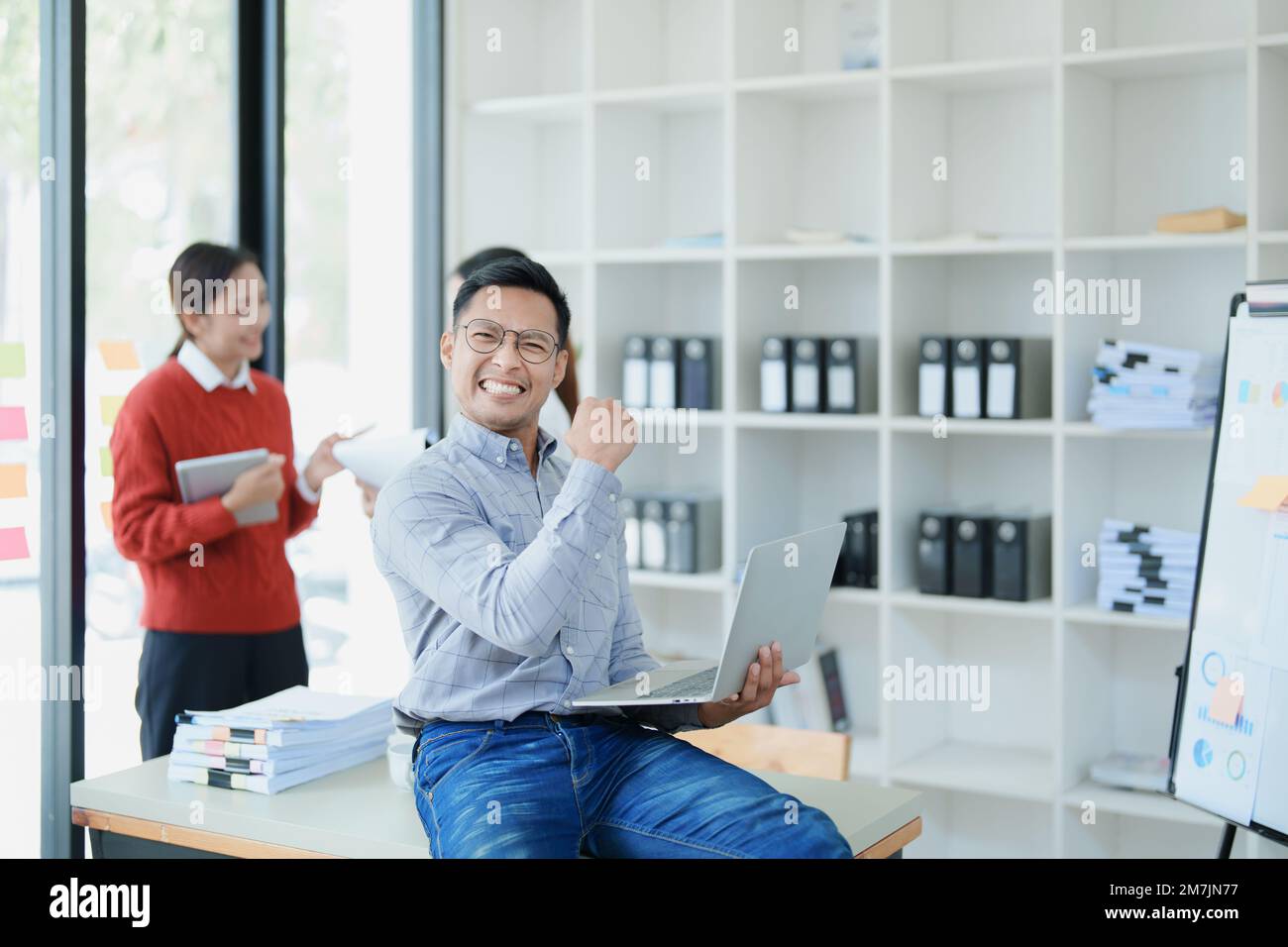 Portrait of a man business owner showing a happy smiling face as he has ...