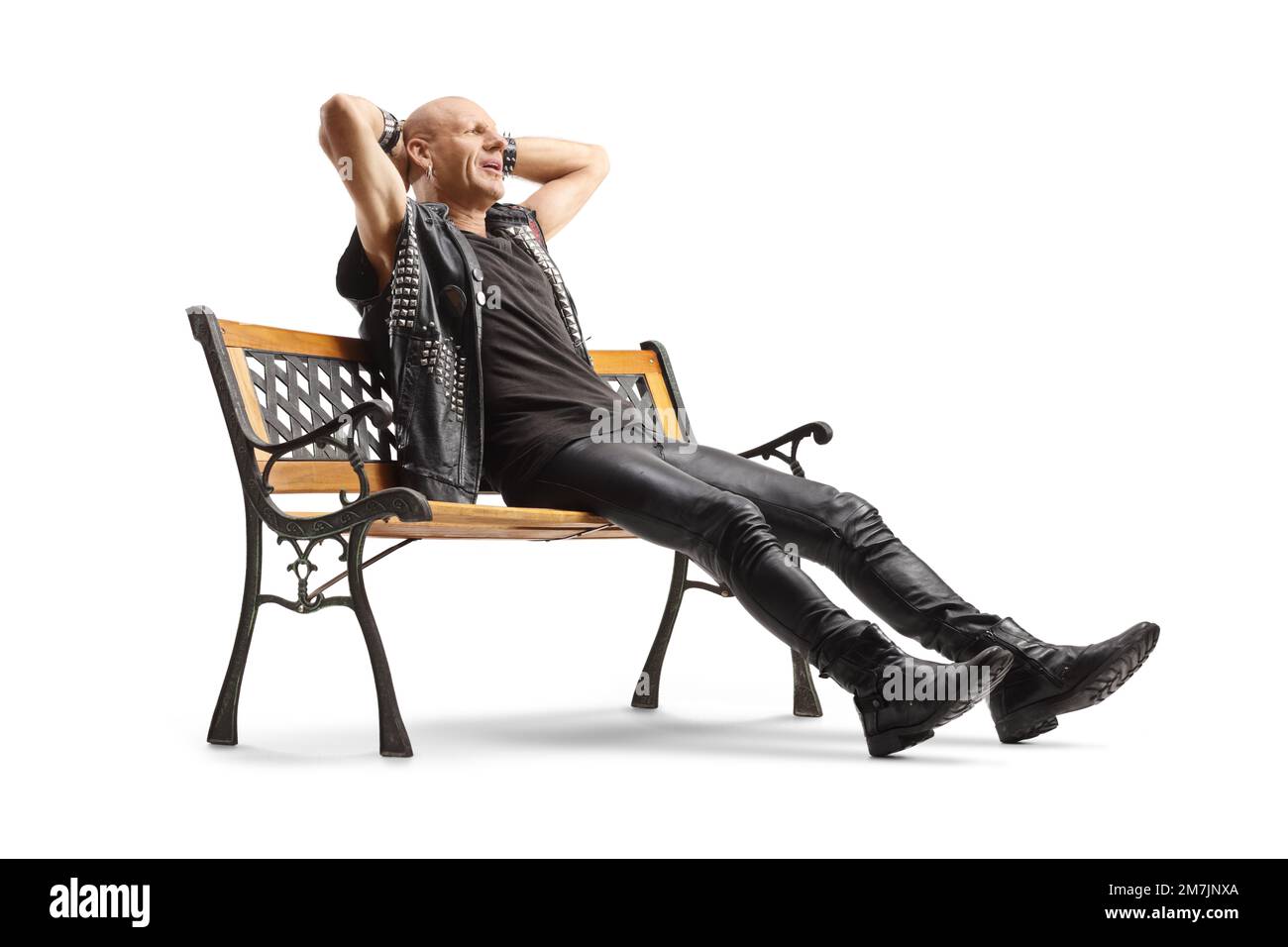 Relaxed punk sitting on a bench isolated on white background Stock ...