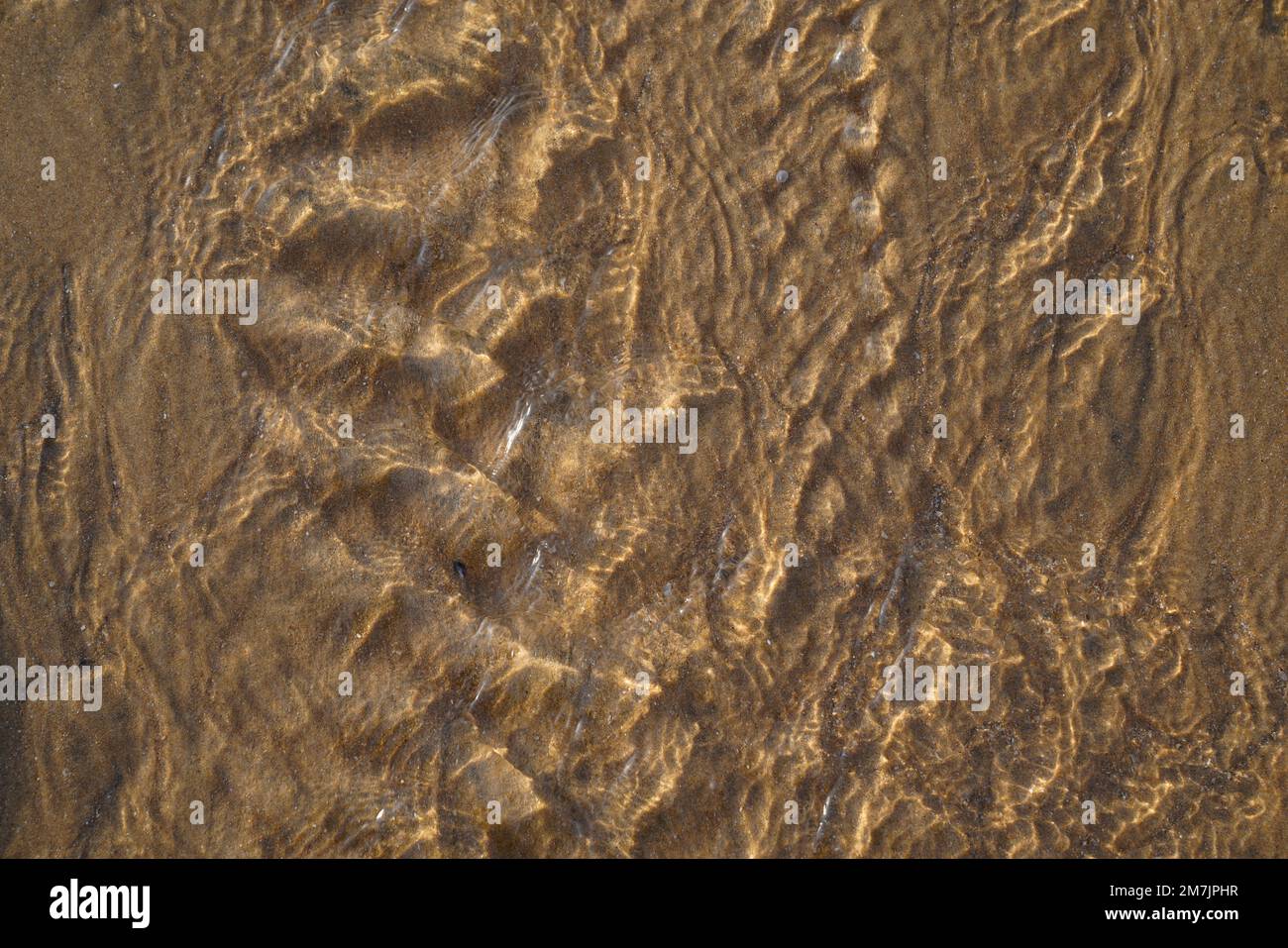 water sea tide topview in sand beach of flat lay ocean sandy background ...