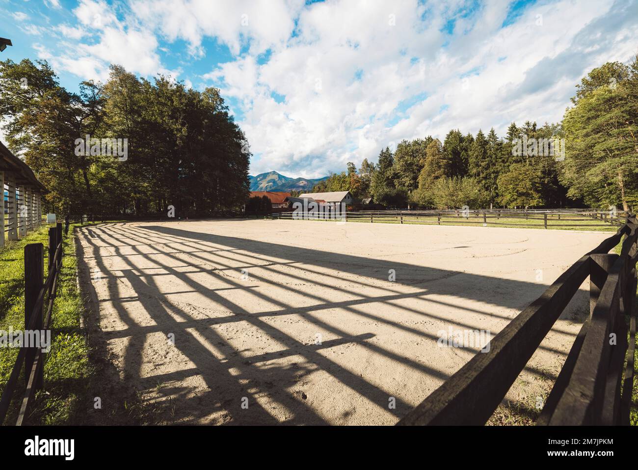 Sunny day out at the Horse ranch and an empty riding ring Stock Photo ...