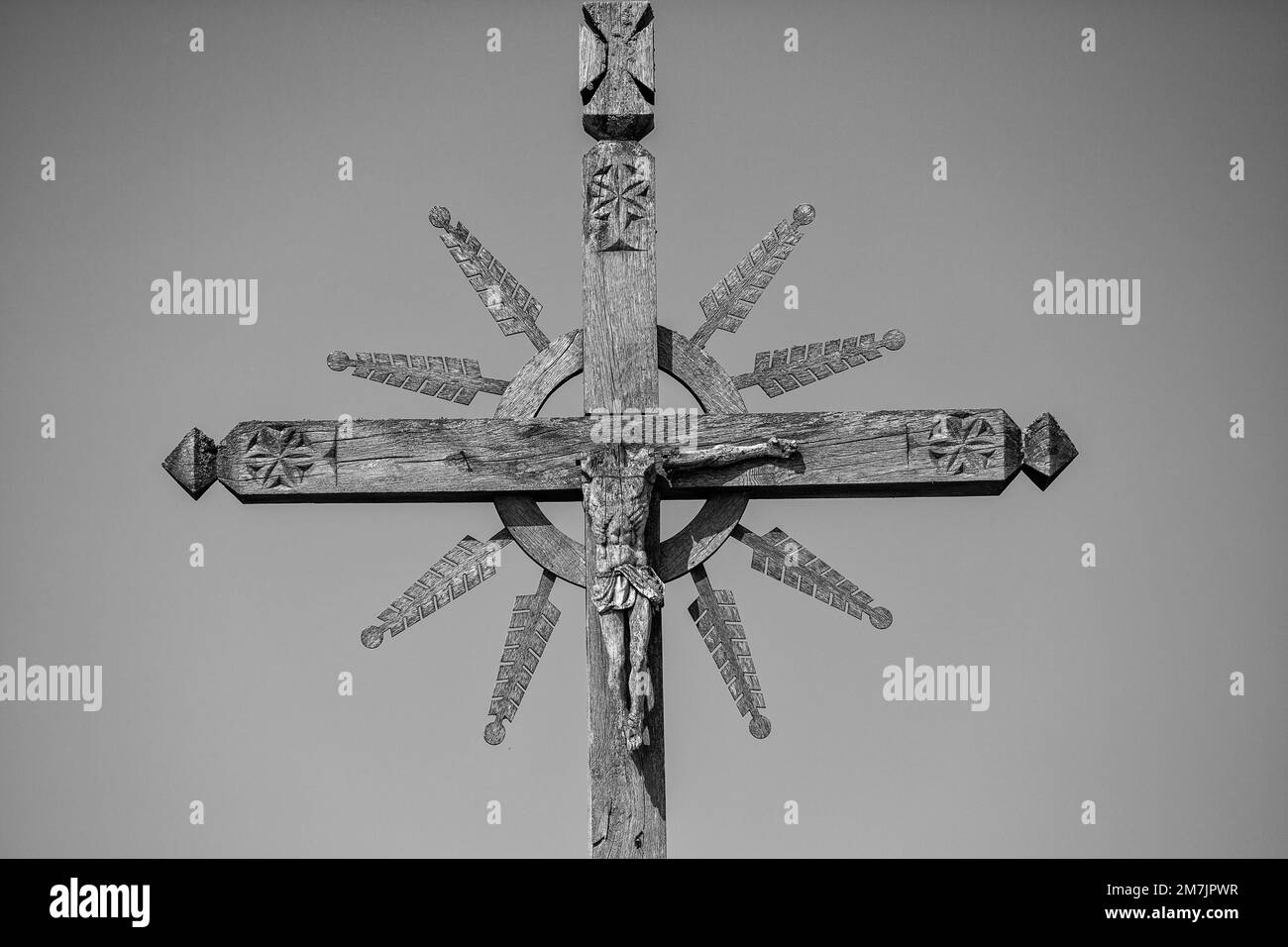 A grayscale shot of a Christian cross at the hill of crosses Stock ...