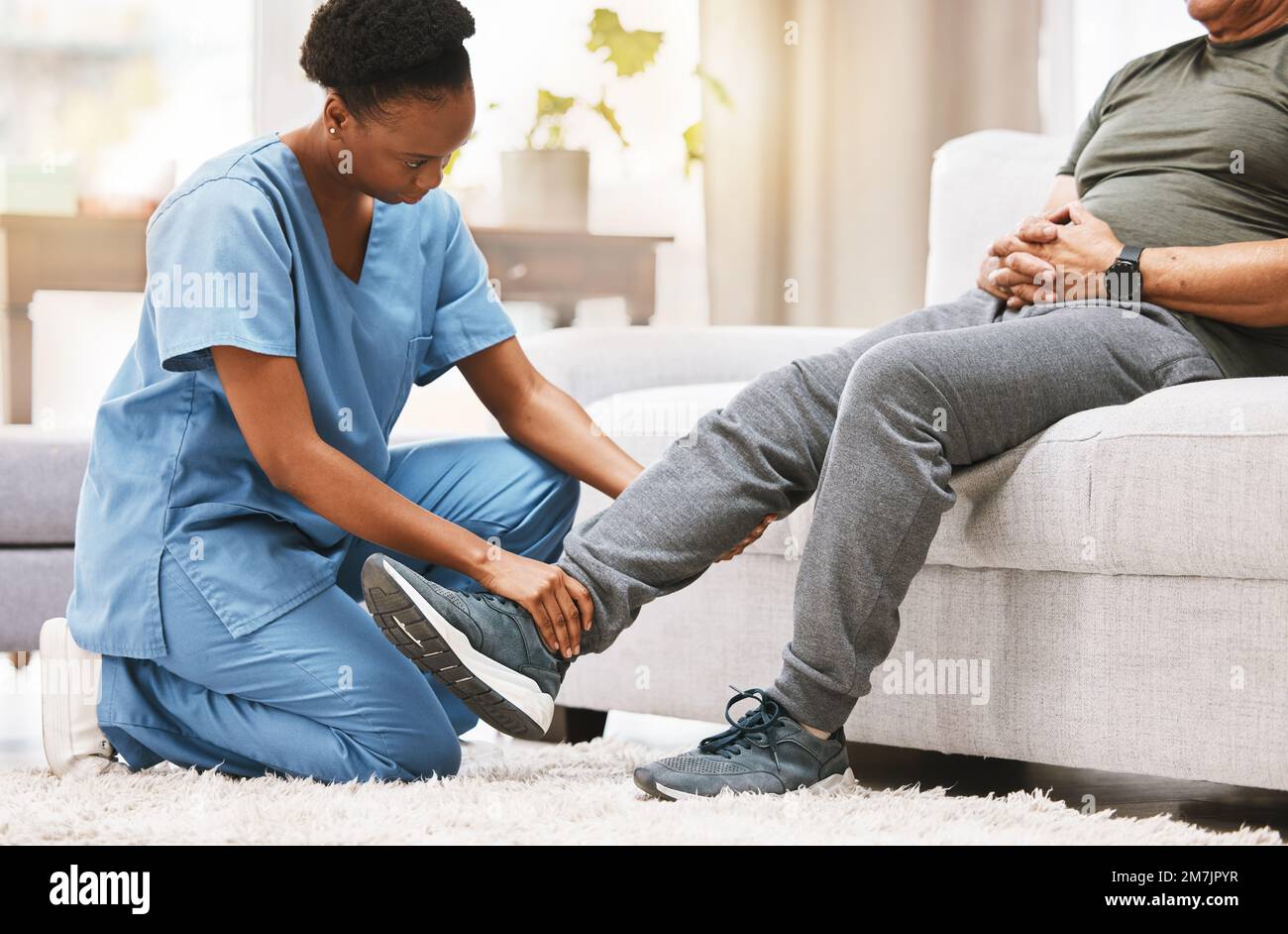 Physiotherapy, nurse with man foot, legs or muscle massage, wellness ...