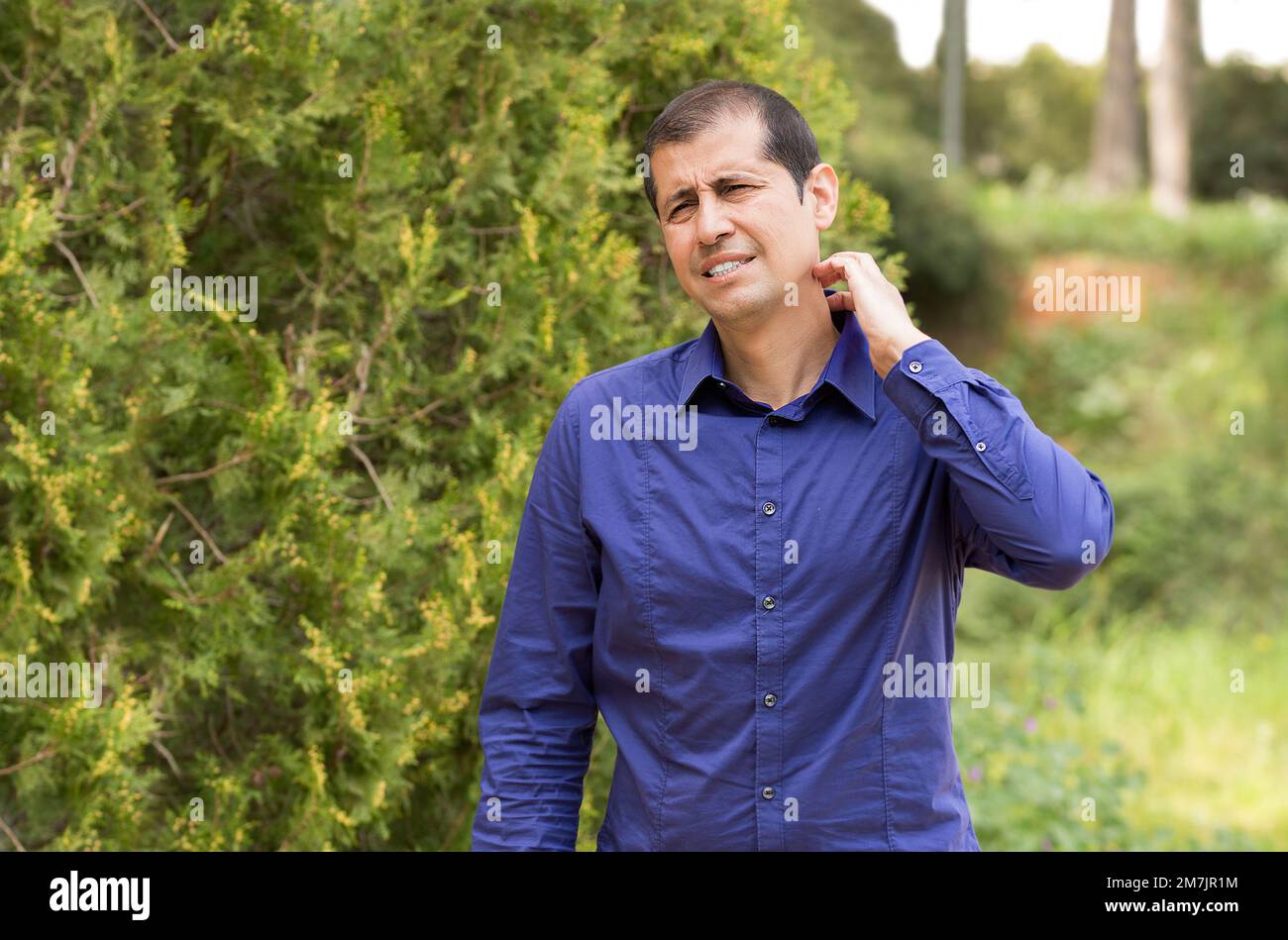 Adult hispanic man allergic irritation hi-res stock photography and ...