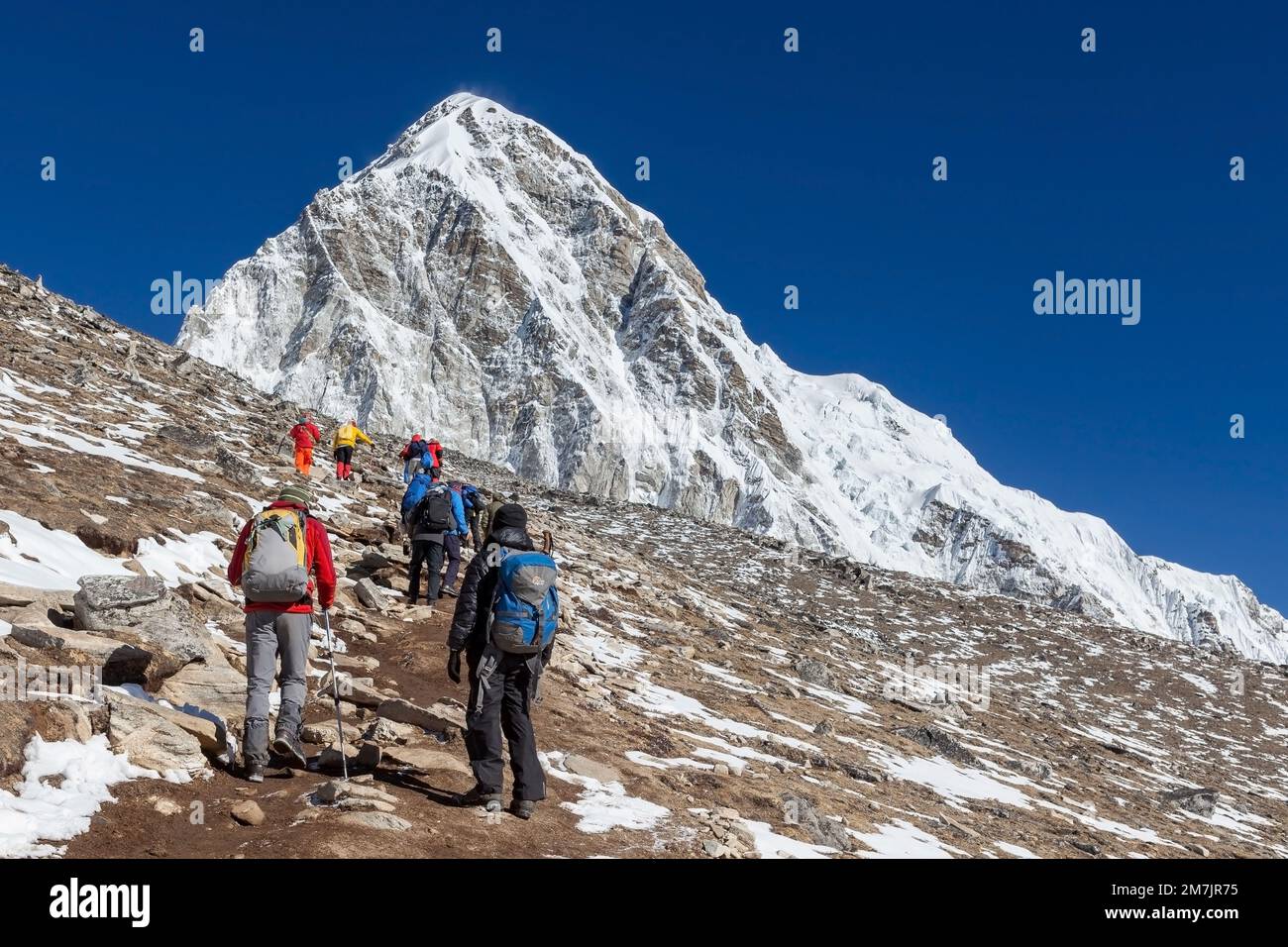 Group of trekkers coming up to Kala Patthar - the Everest mount ...
