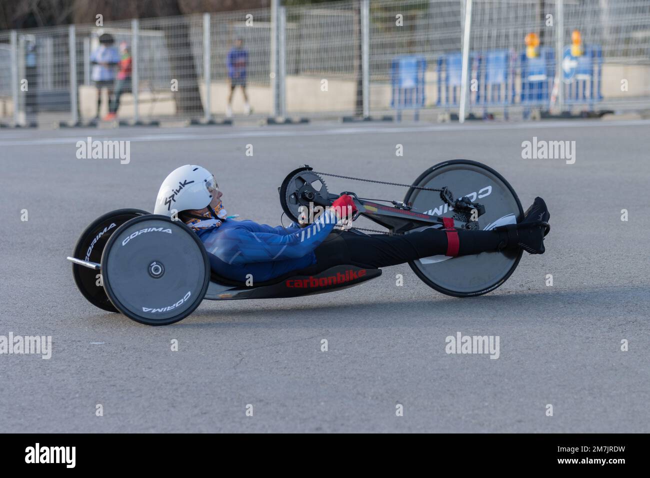 Madrid, Spain - December,31,2022, people with disabilities run with their adapted vehicles where ...