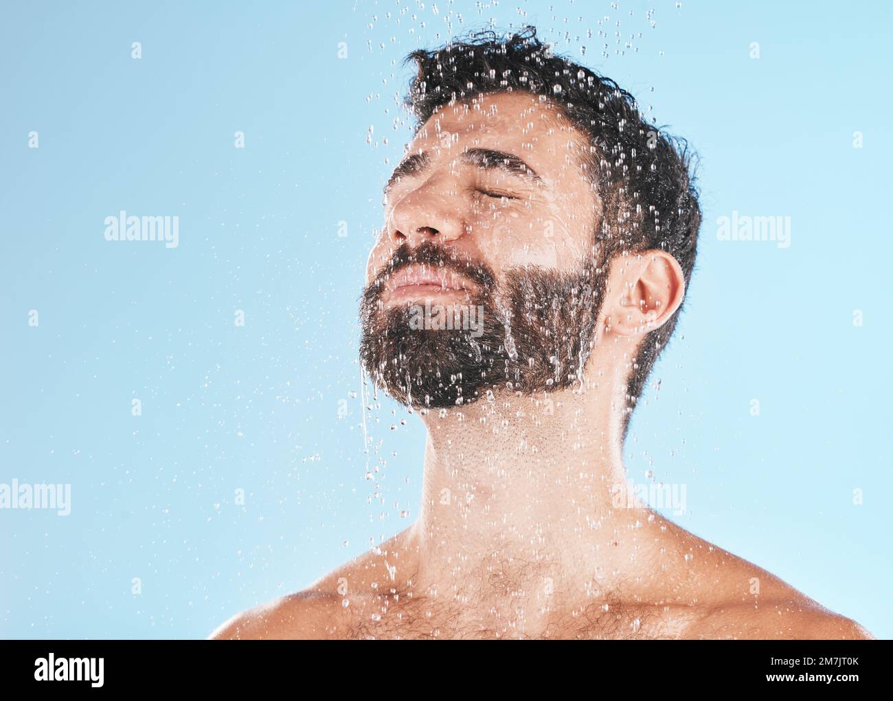 Man shower, cleaning face and studio for self care wellness, relax and ...