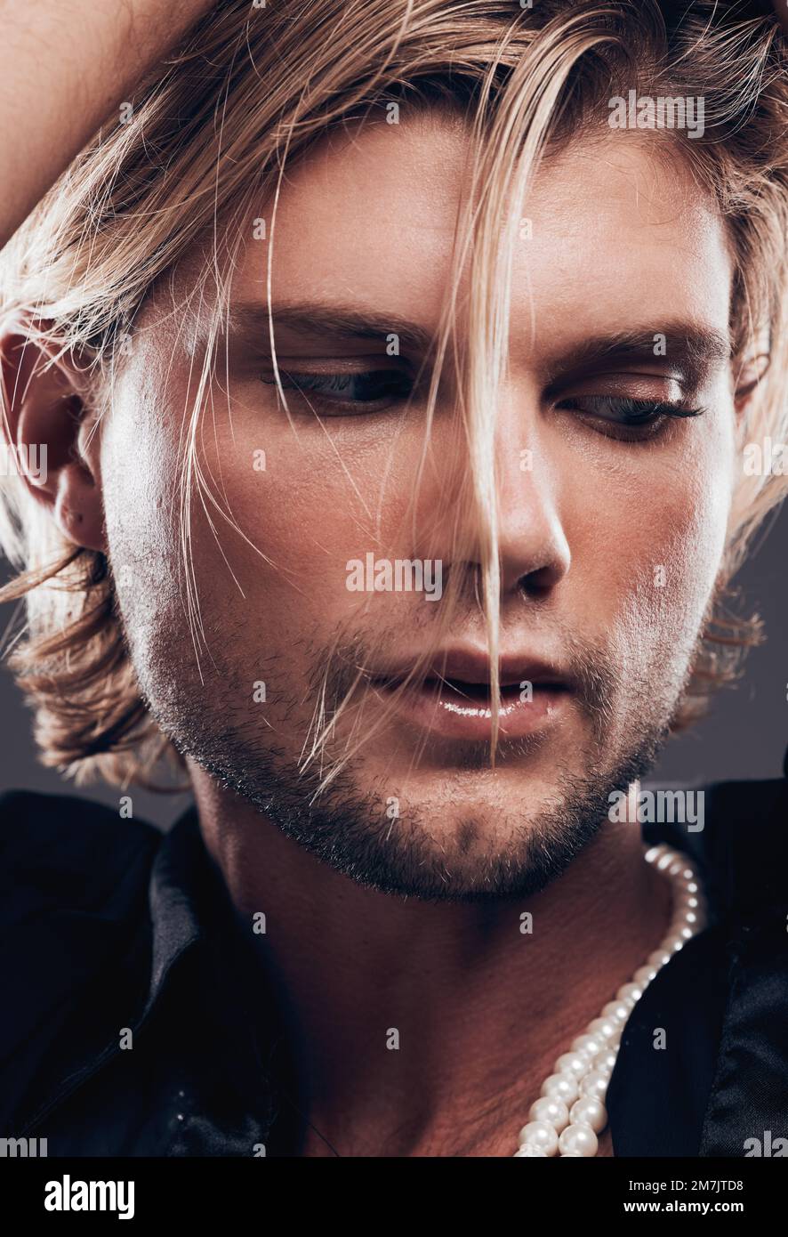 Beauty, fashion and face of man with cosmetics, jewellery and makeup on ...