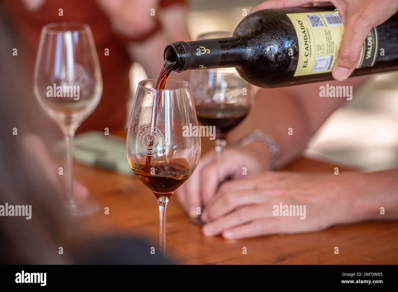 Pouring glass of sherry, Jerez de la Frontera, Spain Stock Photo - Alamy
