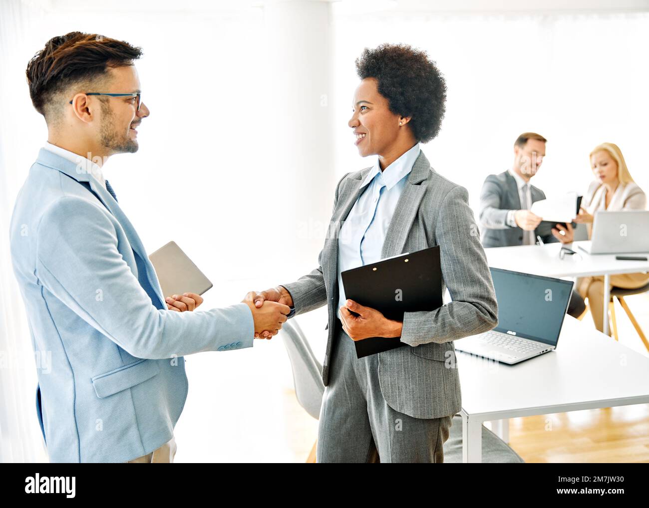 business man office hand shaking meeting agreement handshake young partnership success contract ...
