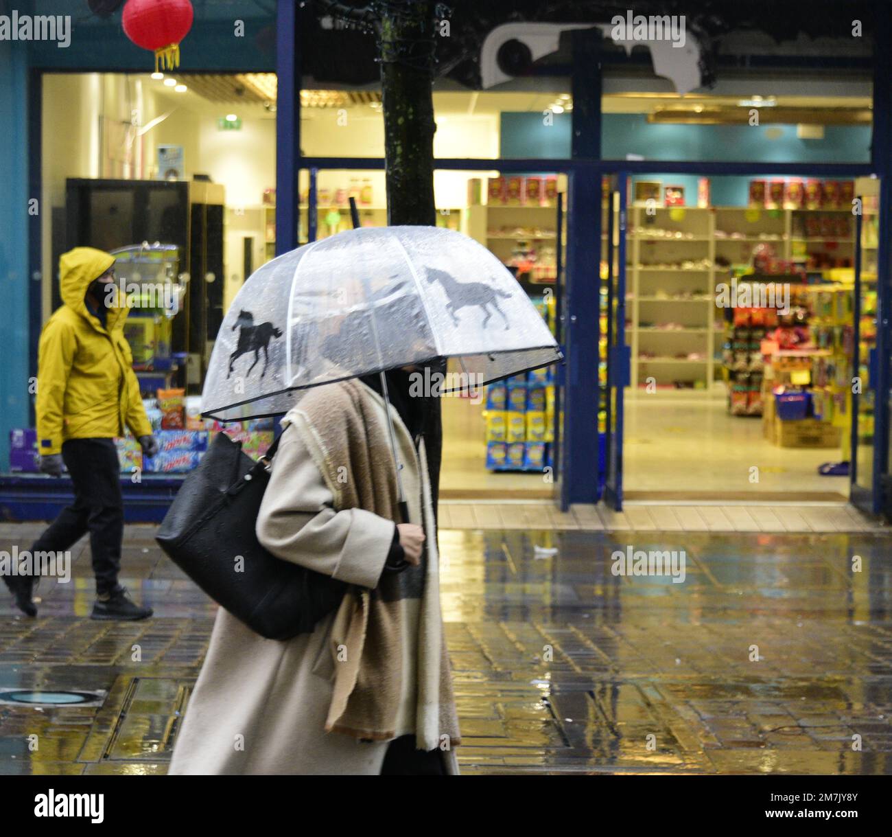 Manchester, UK, 10th January, 2023. Heavy rain in city centre ...