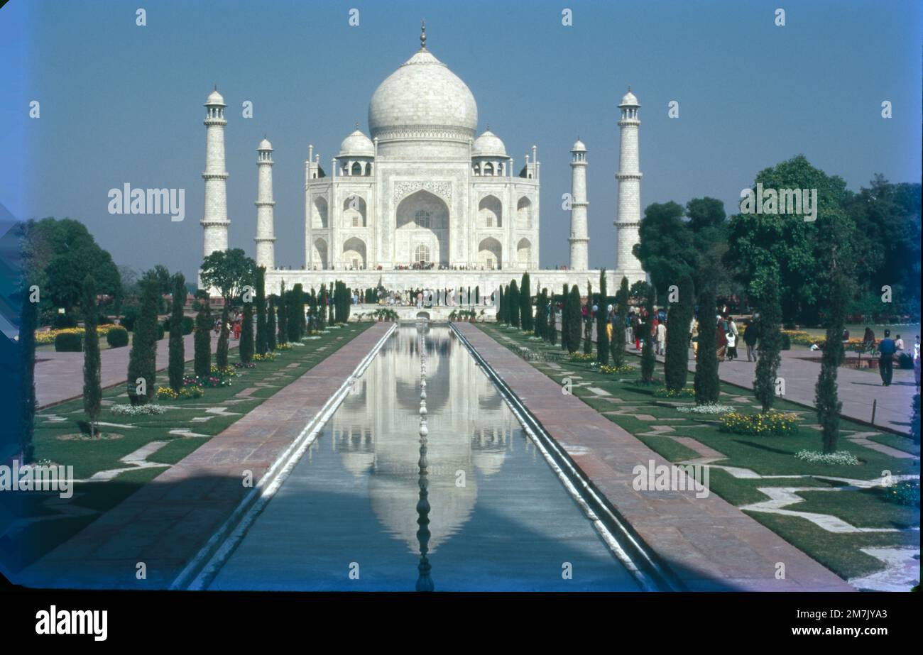 The Taj Mahal is an Islamic ivory-white marble mausoleum on the right ...