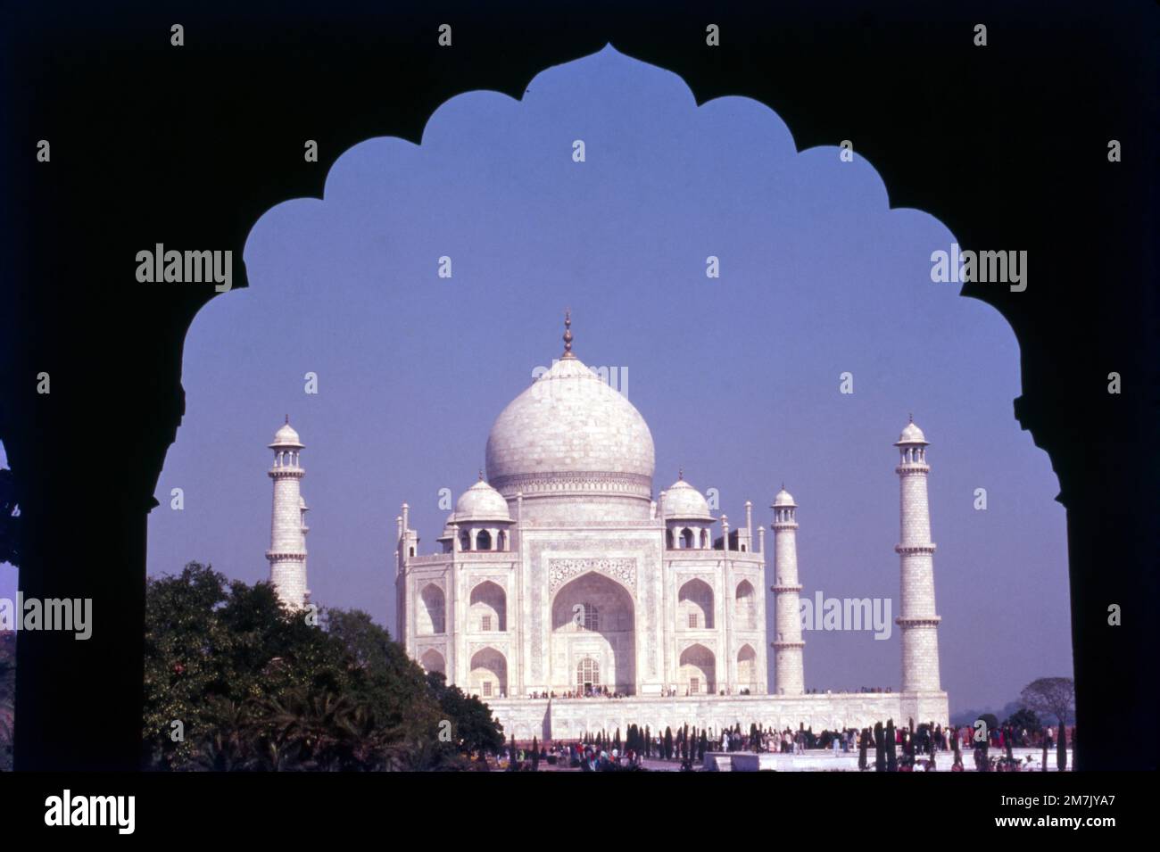 The Taj Mahal is an Islamic ivory-white marble mausoleum on the right ...