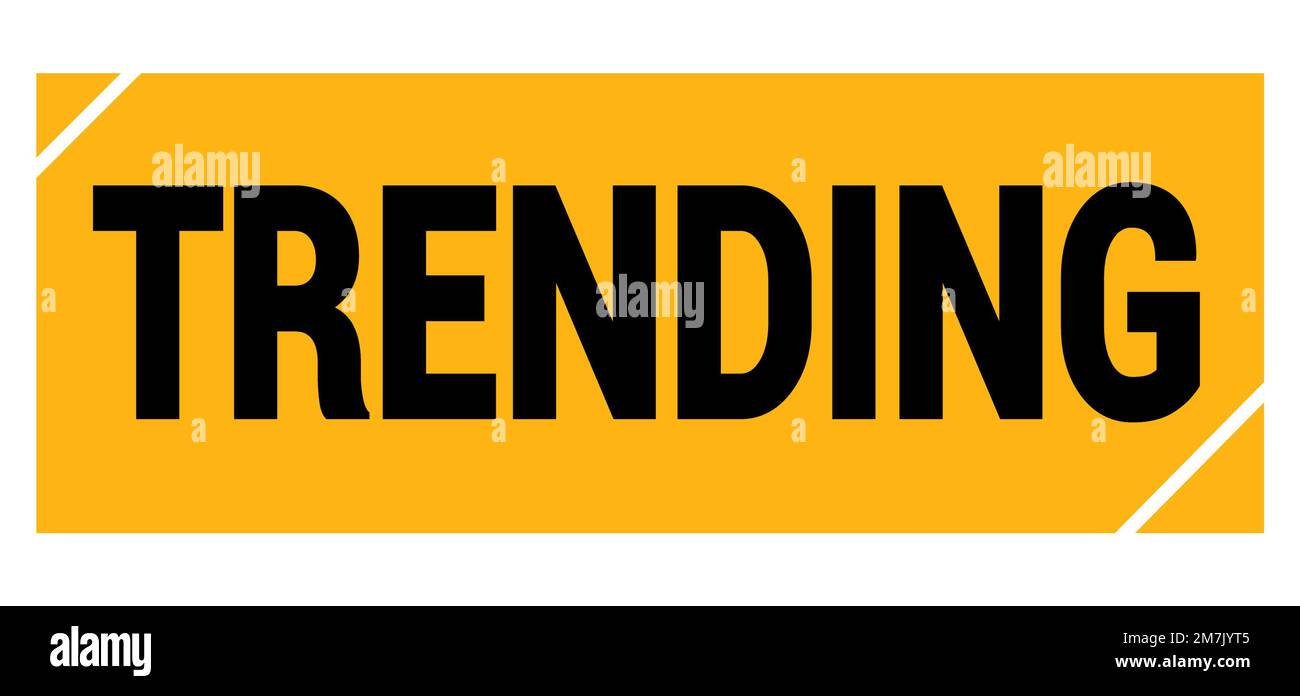 TRENDING text written on yellow-black grungy stamp sign Stock Photo - Alamy