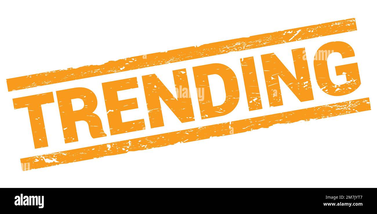 TRENDING text written on orange rectangle stamp sign Stock Photo - Alamy