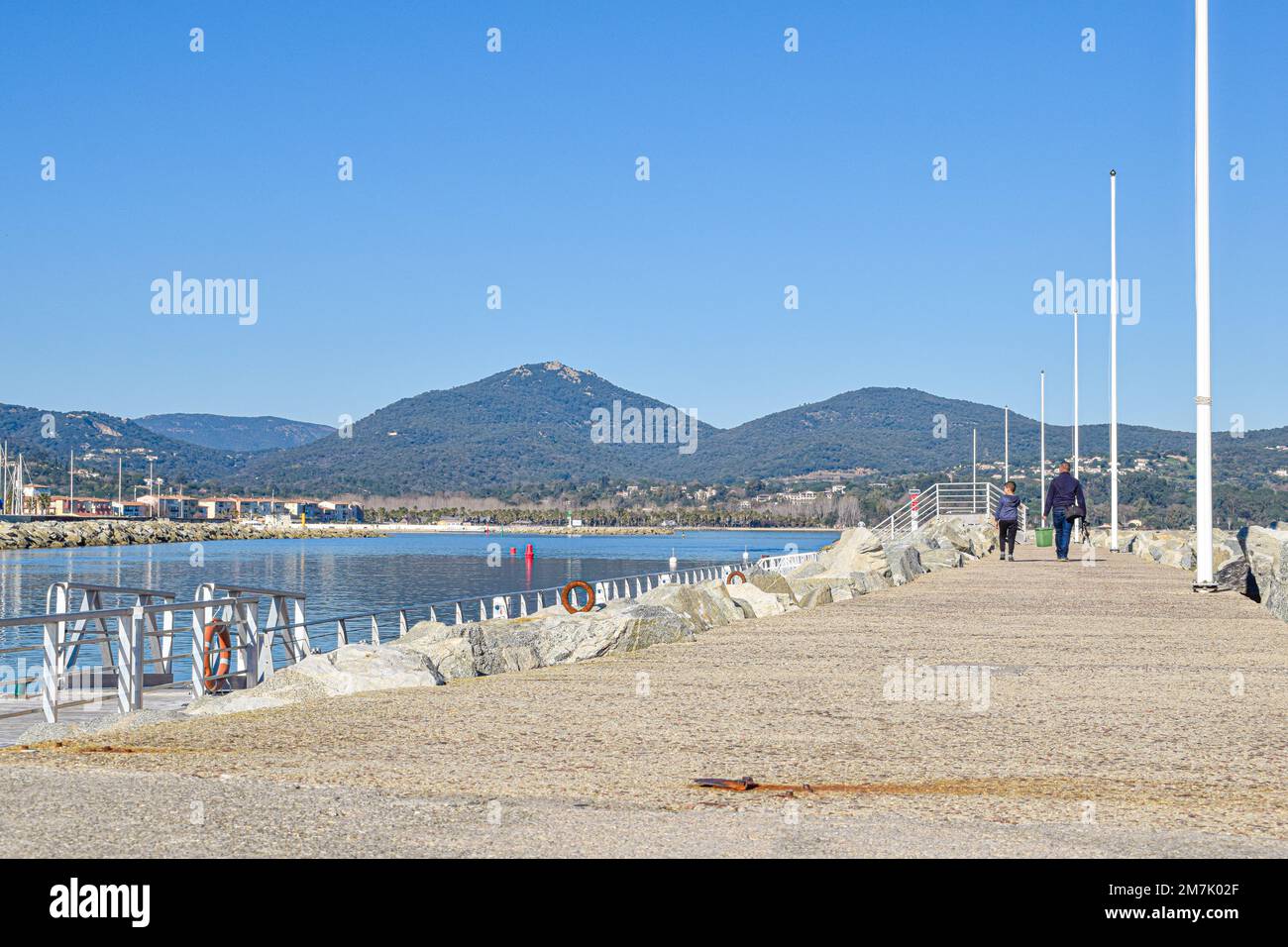 Father and sone going on the ship dock fishing breakwater Stock Photo ...