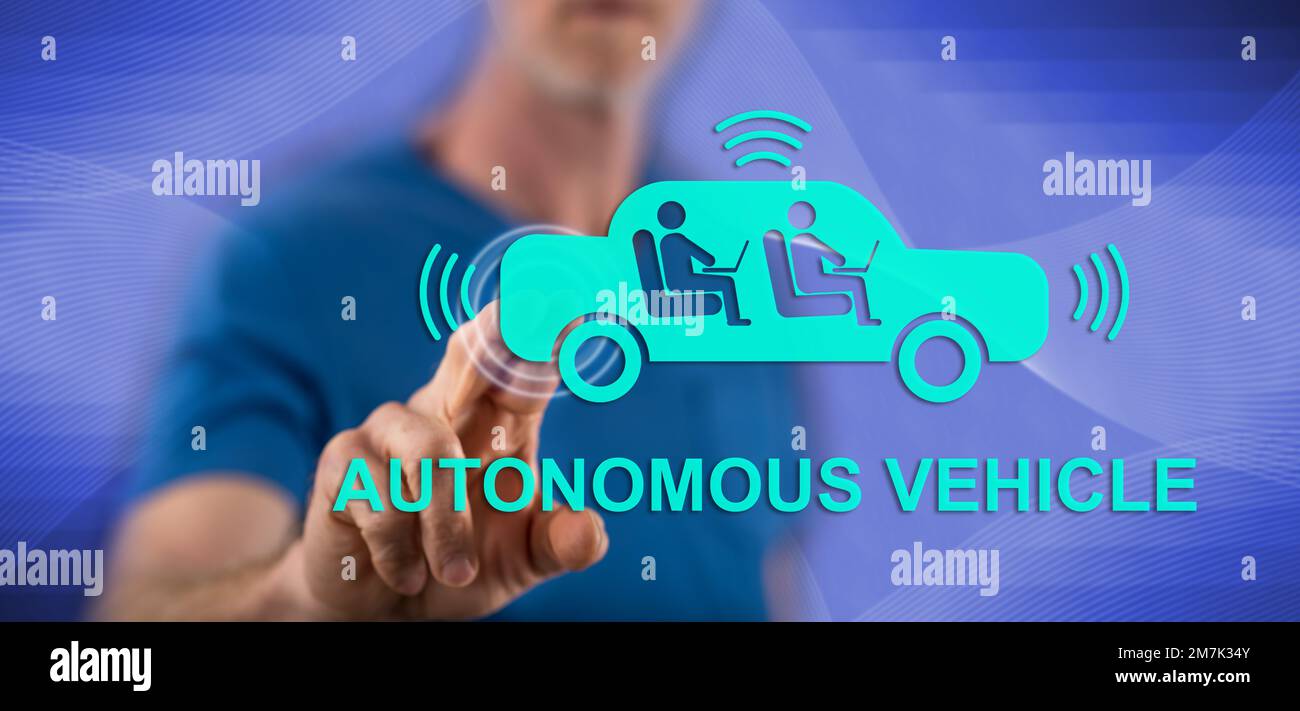 Man Touching An Autonomous Vehicle Concept On A Touch Screen With His