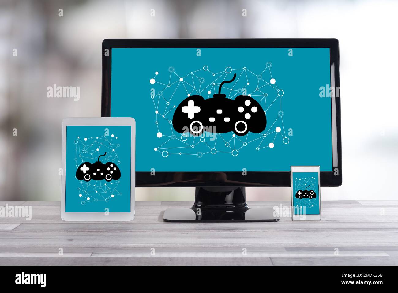 Online gaming concept shown on different information technology devices ...