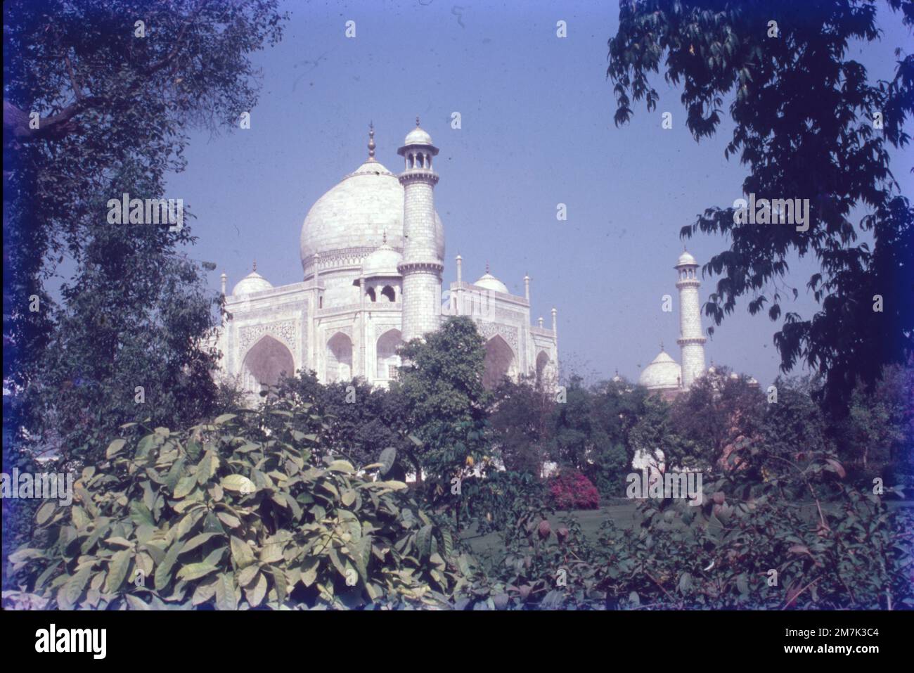 The Taj Mahal is an Islamic ivory-white marble mausoleum on the right ...