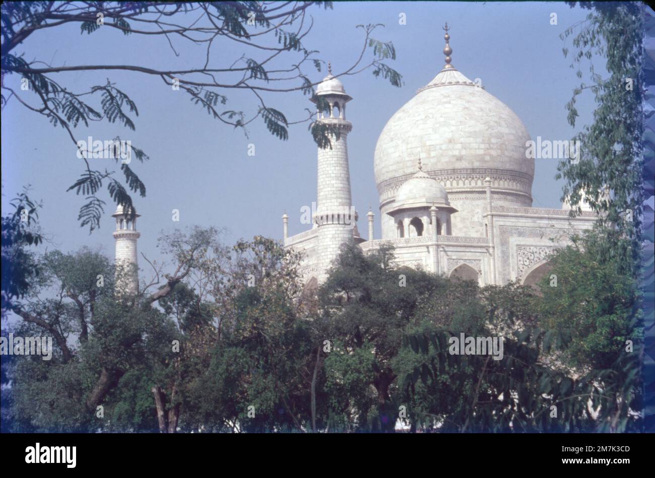 The Taj Mahal is an Islamic ivory-white marble mausoleum on the right ...