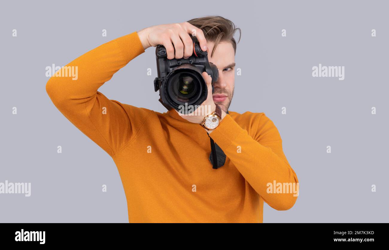 man photographer take picture with camera in studio. man photographer ...