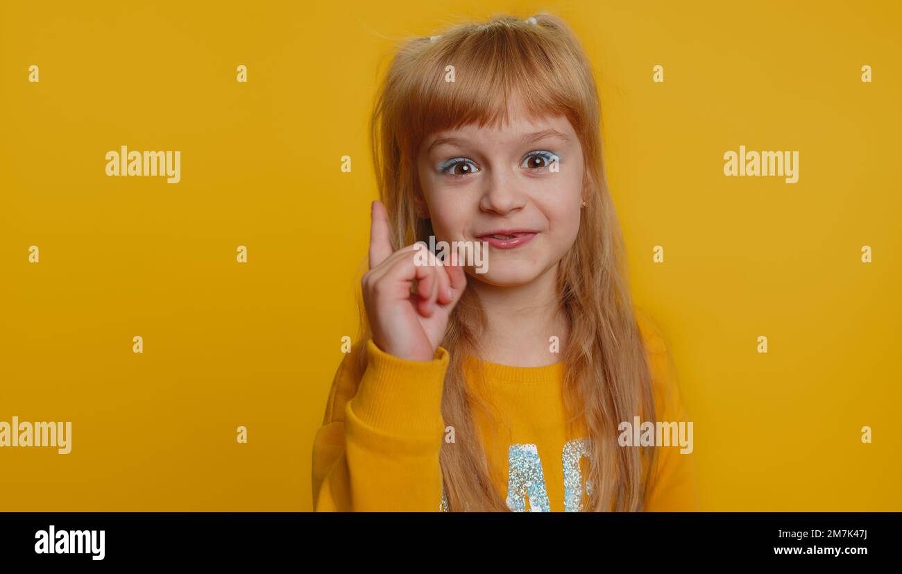 Young preteen child girl kid shakes finger and saying no, be careful ...