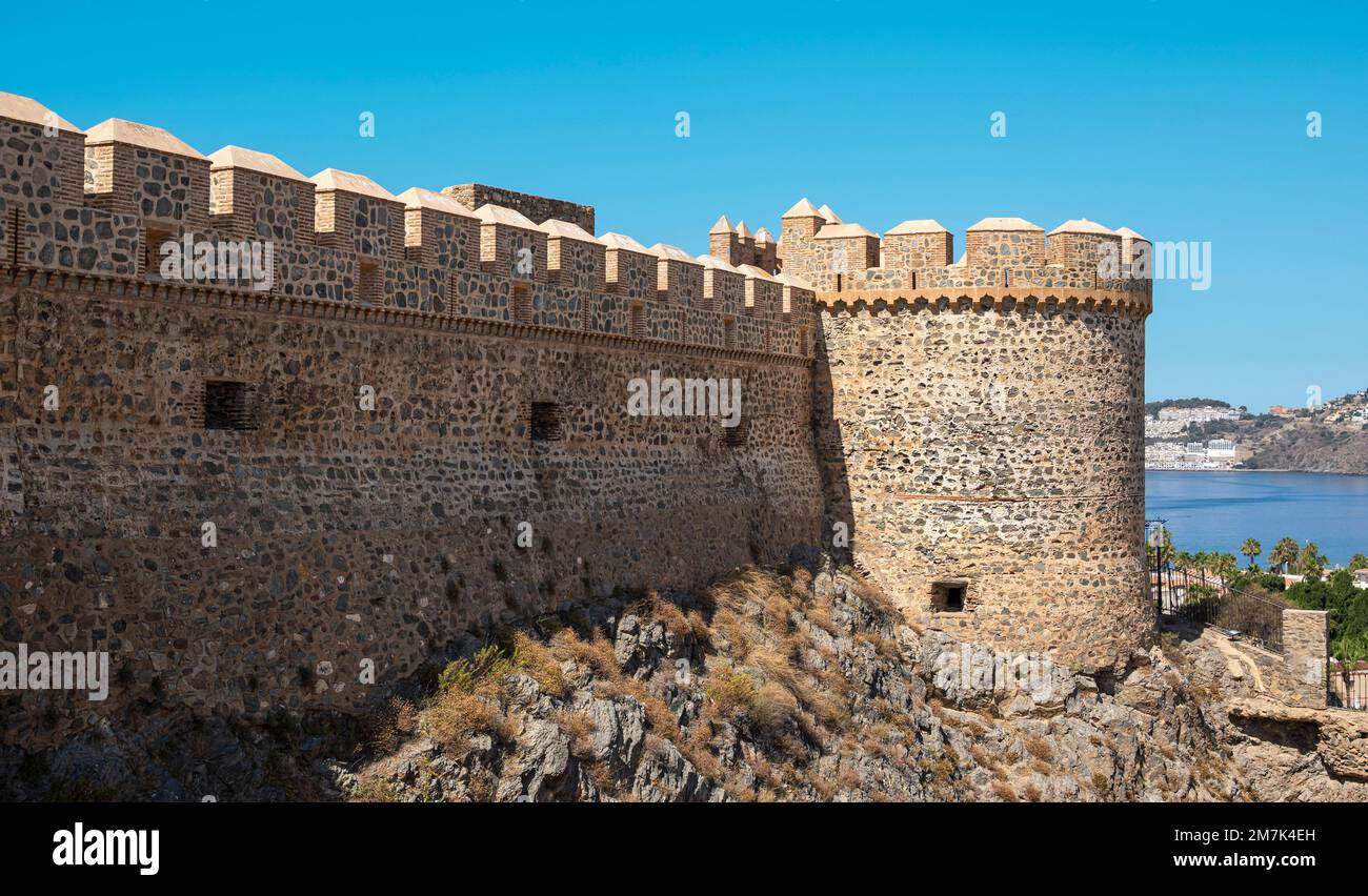 The Crenellated walls of the medieval castle of San Miguel in the town ...