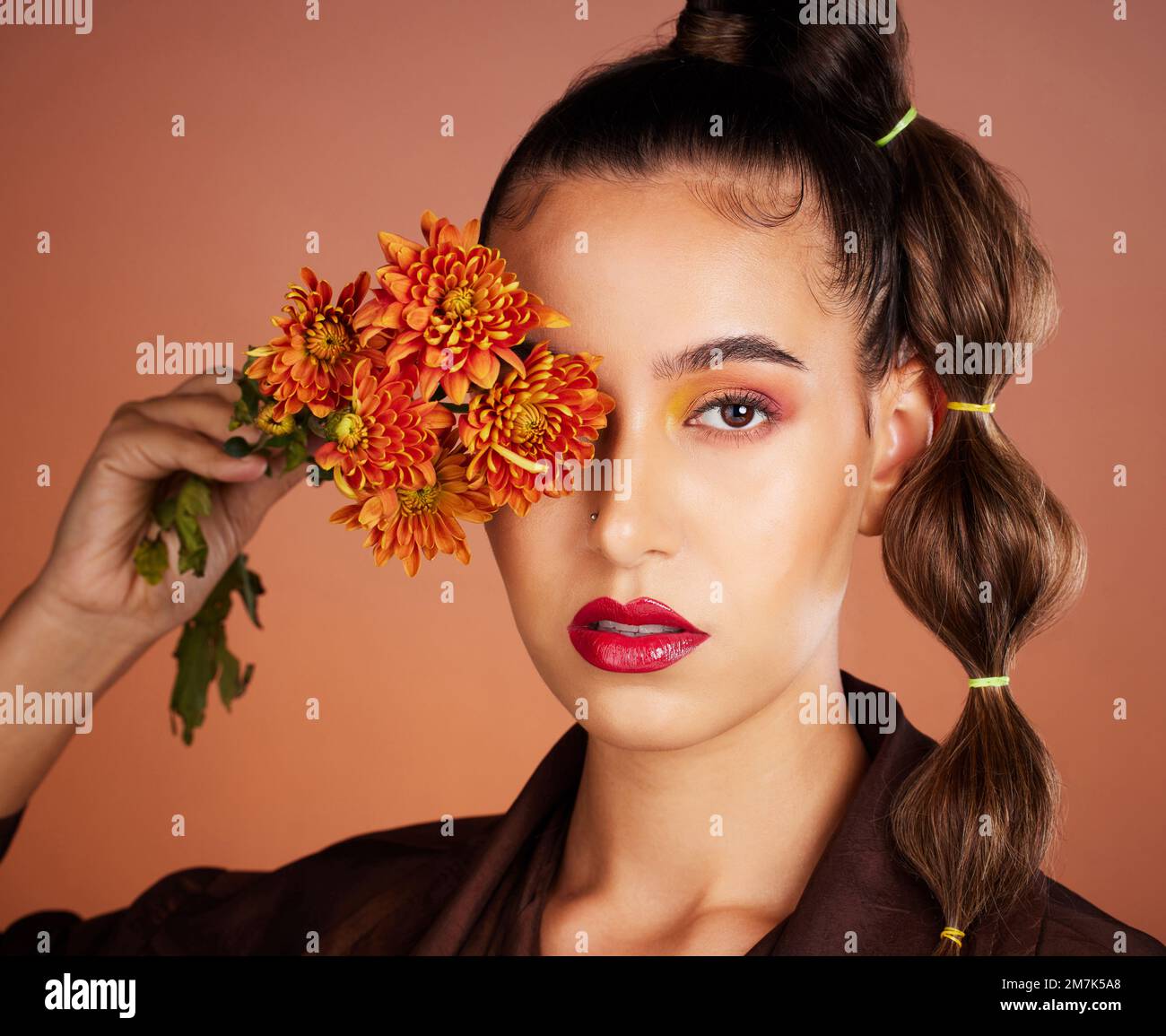Makeup, beauty or woman in studio with flowers for art fashion and ...