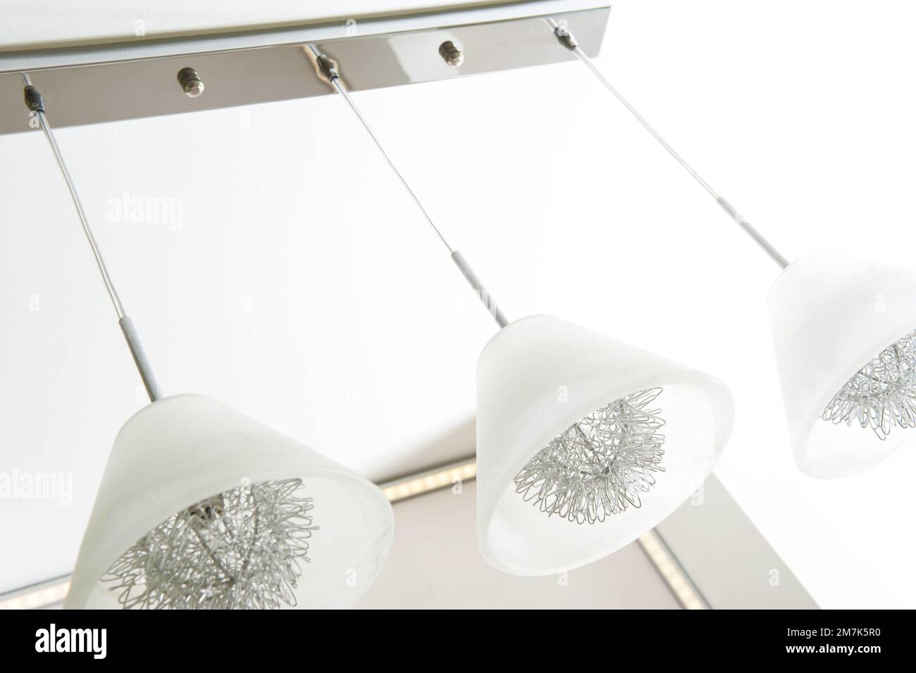 Abstract white background with lamps in the kitchen Stock Photo - Alamy