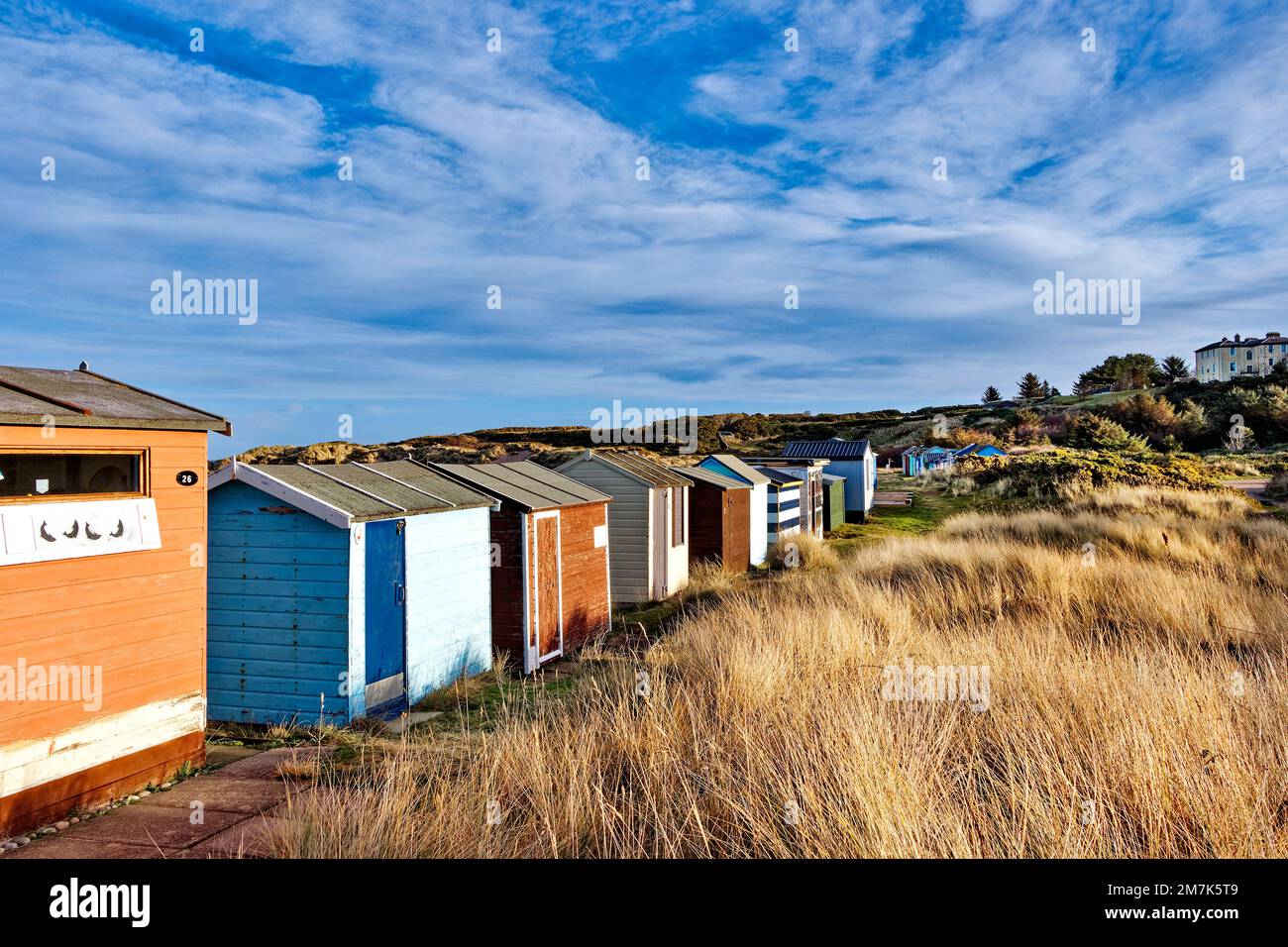 Hopeman village Moray Coast Scotland sunlight on a row of colourful ...