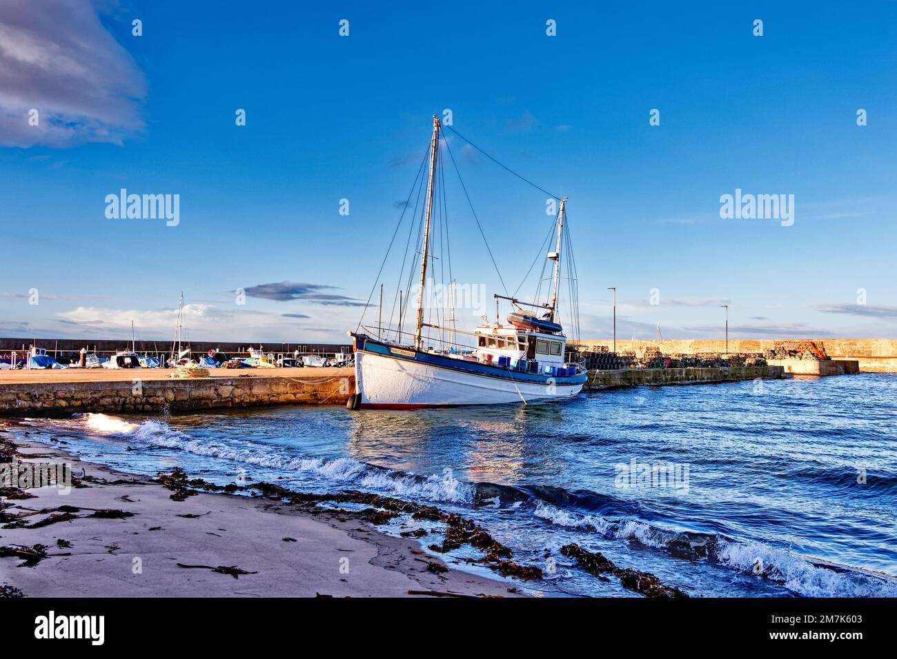 Hopeman village Moray Coast Scotland the small harbour with moored ...