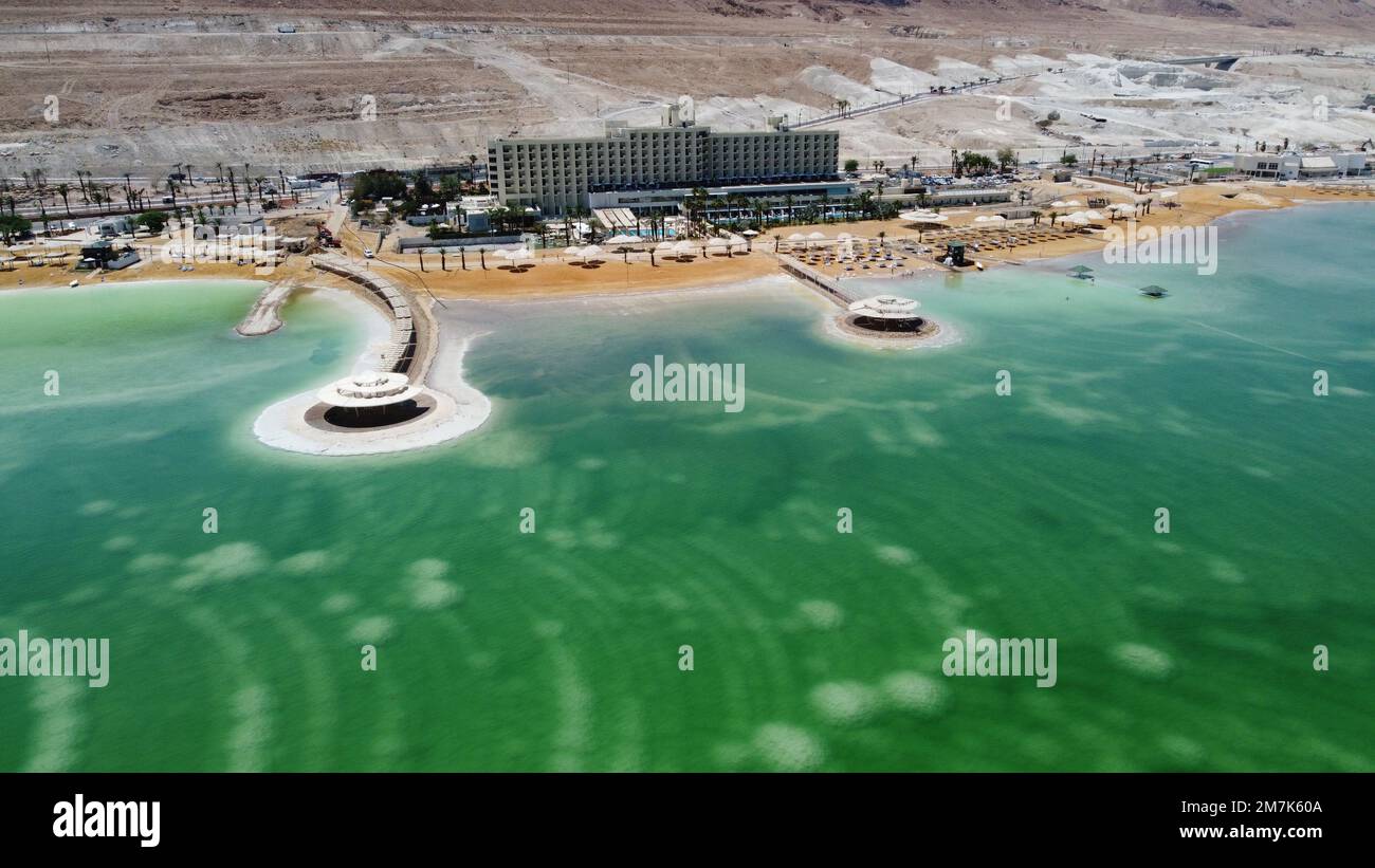 Desert view with dead sea green water. Taken by aerial footage perfect ...