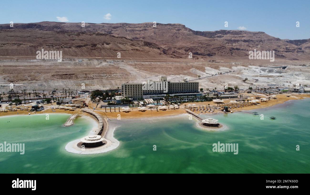 Desert view with dead sea green water. Taken by aerial footage perfect ...