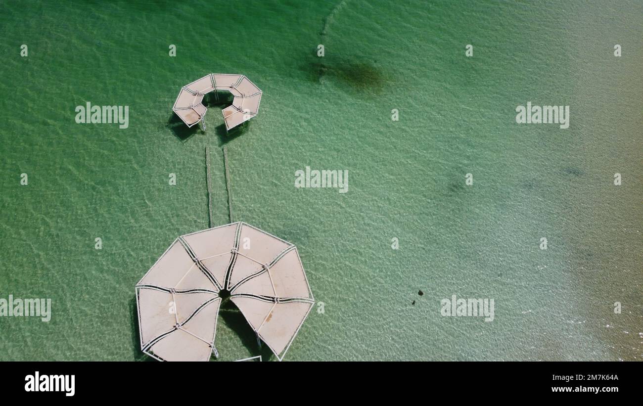 Desert view with dead sea green water. Taken by aerial footage perfect ...