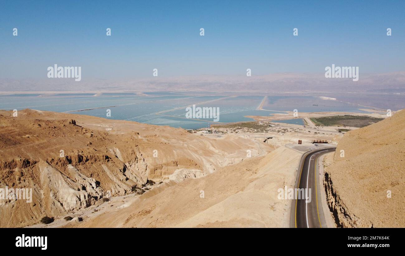 Desert view with dead sea green water. Taken by aerial footage perfect ...