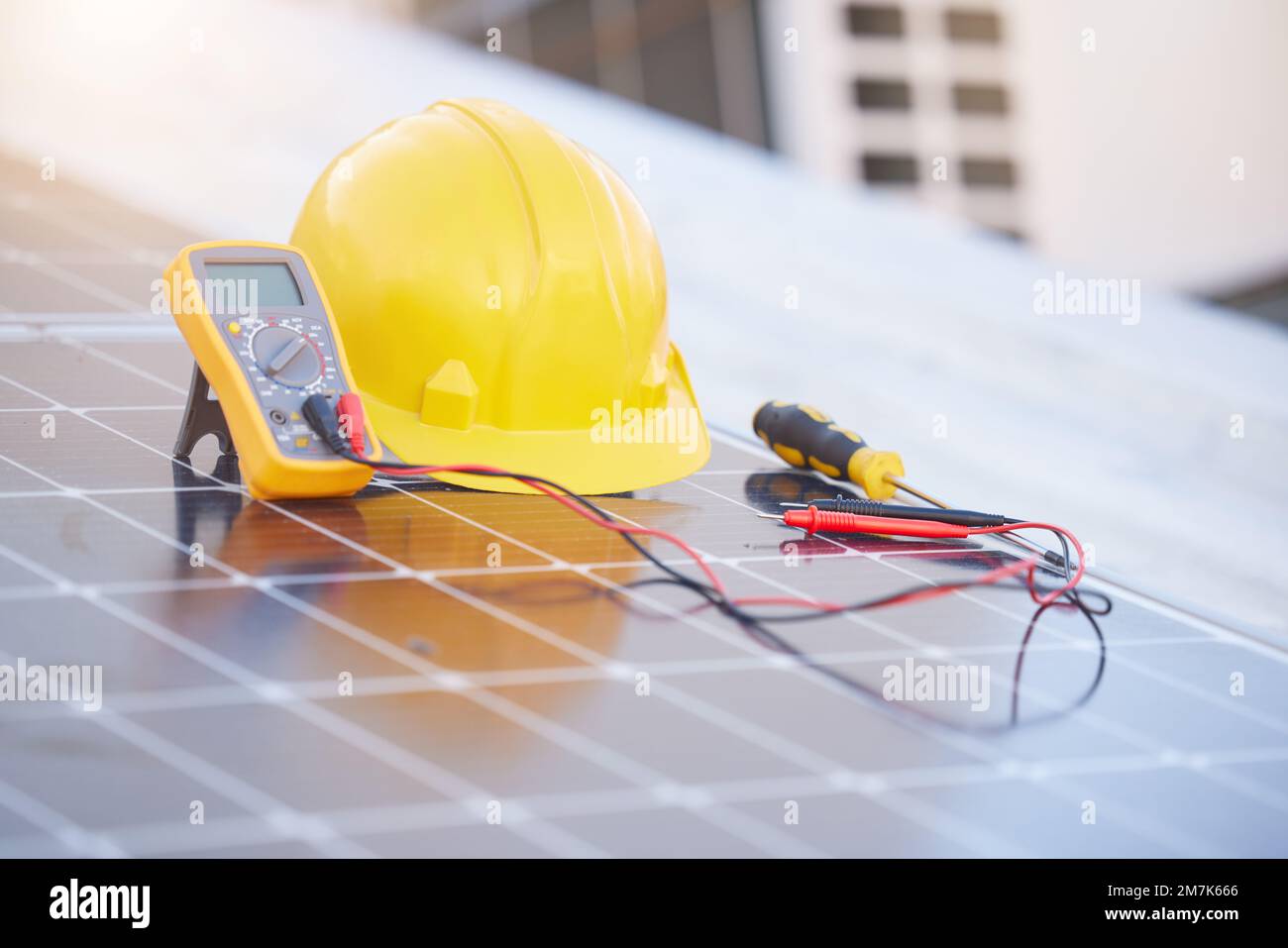 Tools, solar panels or helmet on roof for solar energy installation in ...