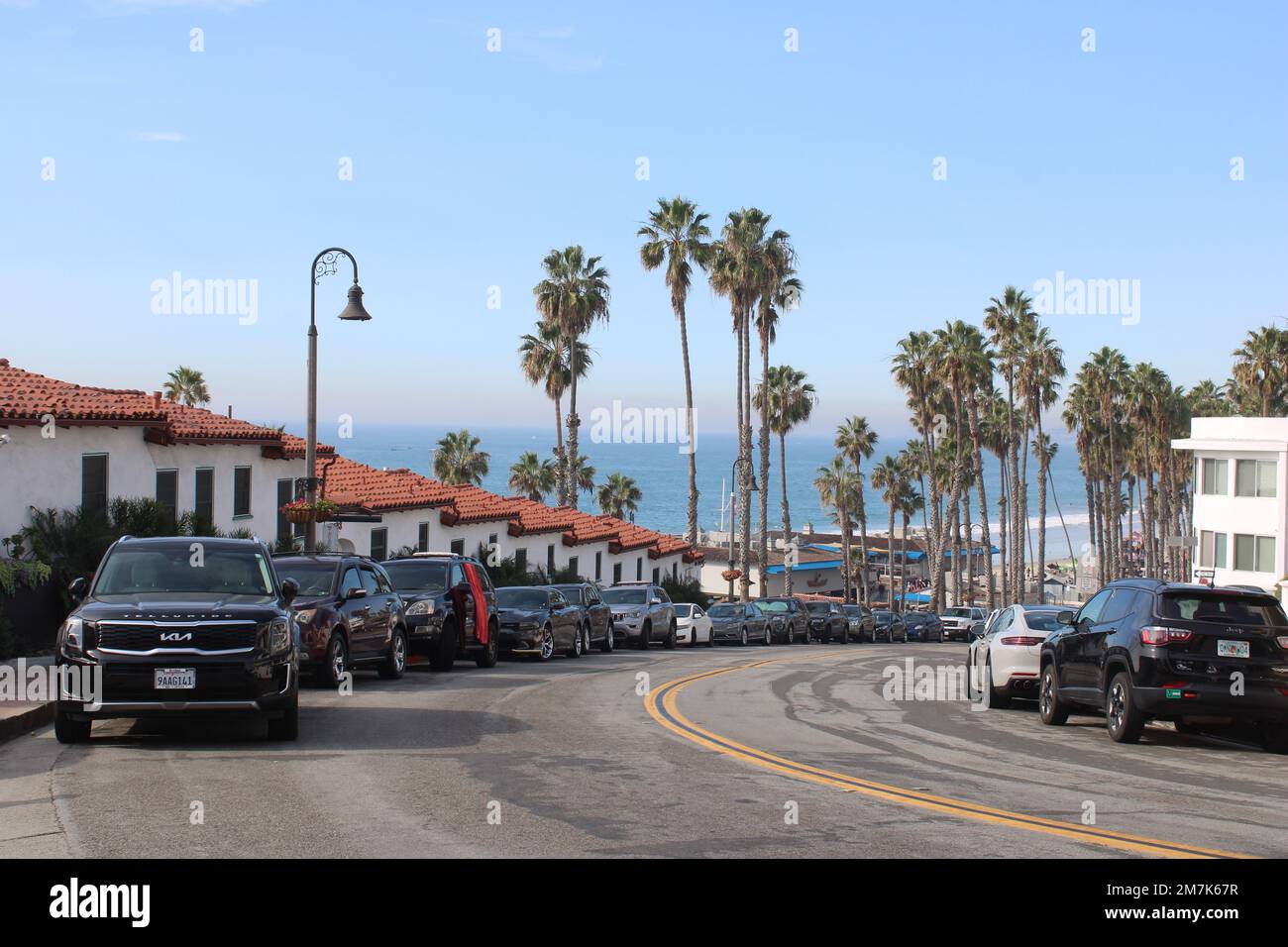 Cars going down main street hi-res stock photography and images - Alamy