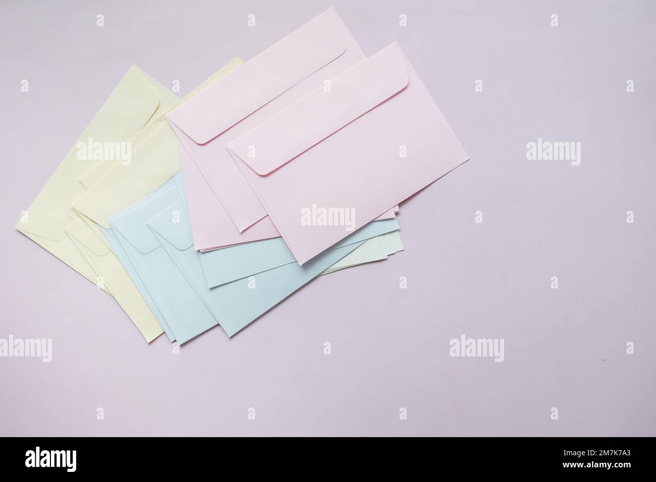 colorful envelope on pink background with copy space Stock Photo - Alamy