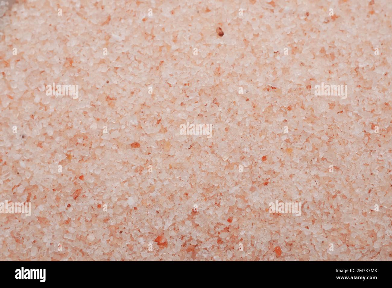 Raw dried pink Himalayan salt in a container Stock Photo - Alamy