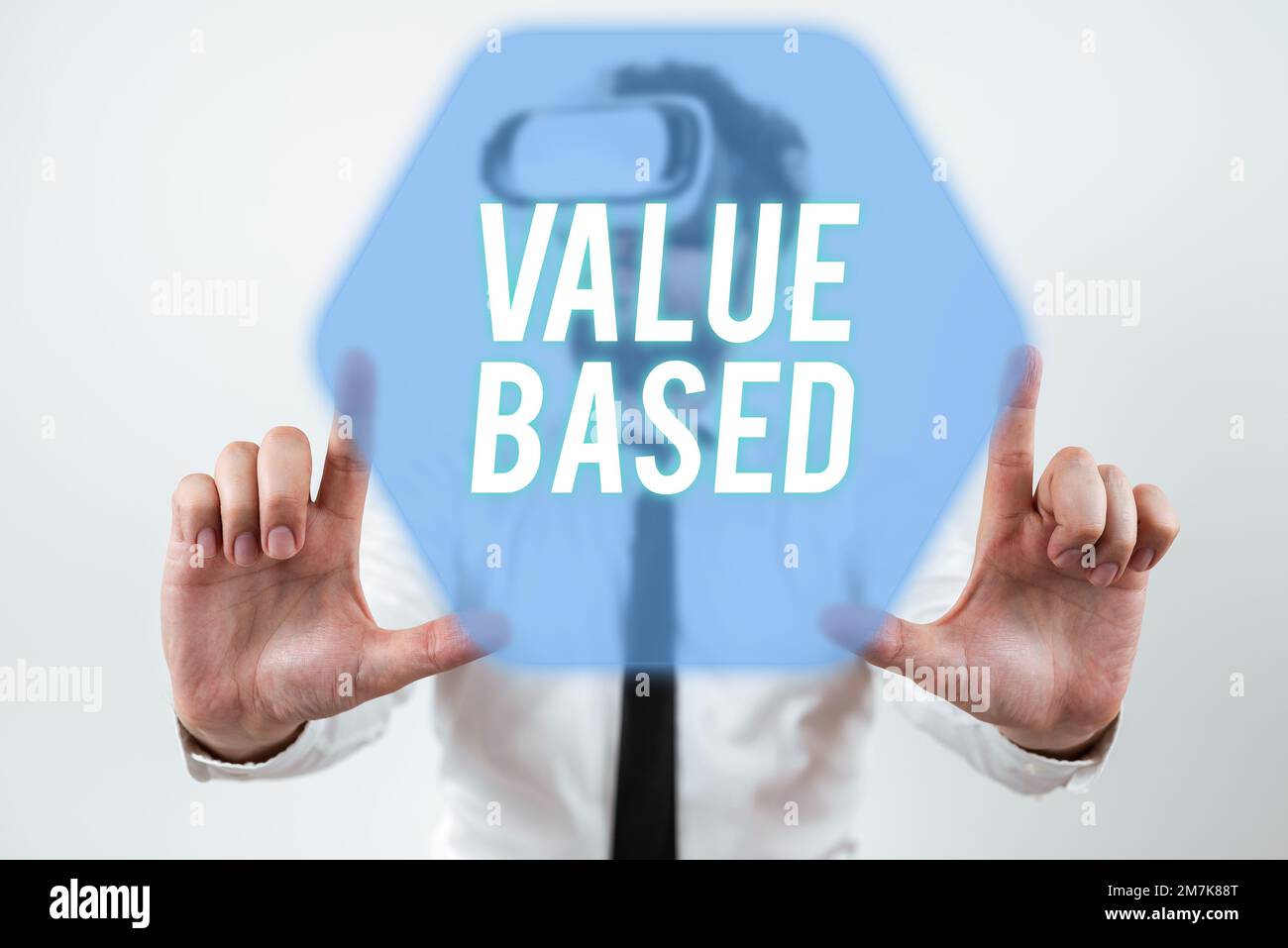 Sign displaying Value Based. Word for Considering the product worth in ...