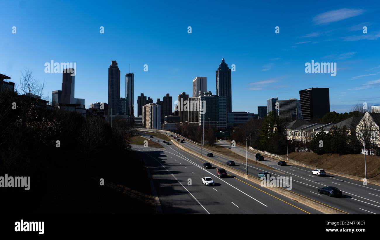 Atlanta skyline with cars passing by Stock Photo - Alamy