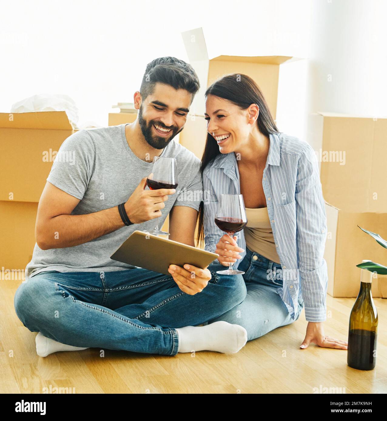 woman couple man box home house moving happy apartment together ...