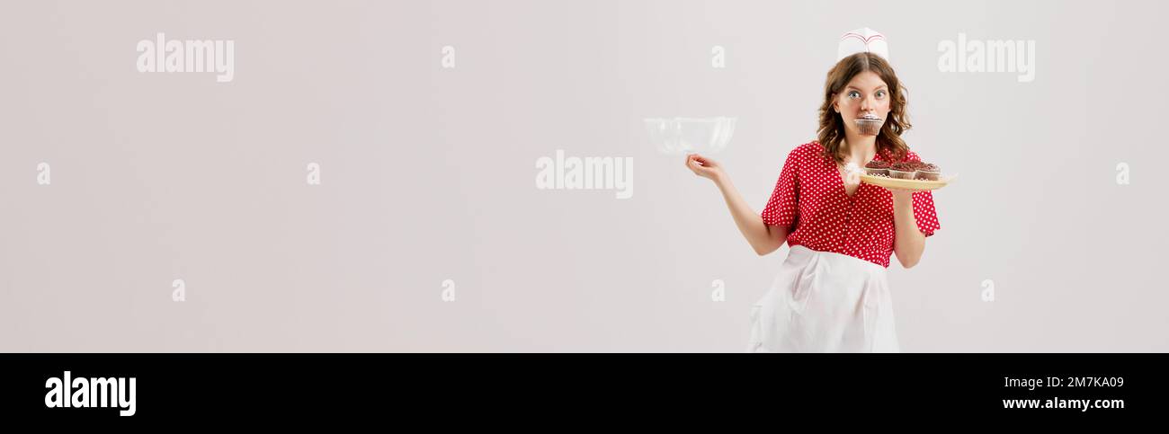 Portrait of young female waitress, woman in retro american fashion ...