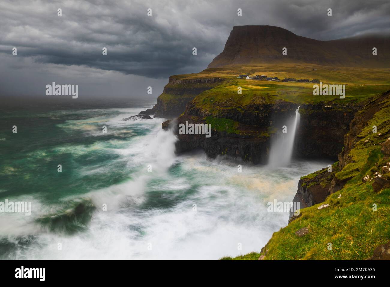 Mulafossur waterfall with Arnafjall and Heinanova mountains in the ...