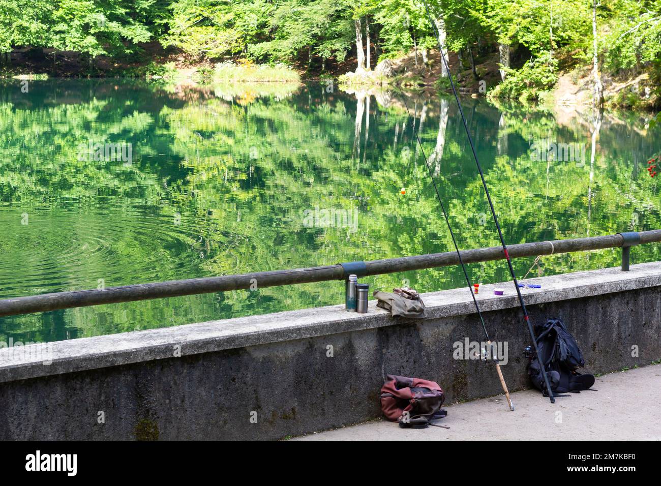 Fishing rods against a barrier at one of the most breathtakingly ...