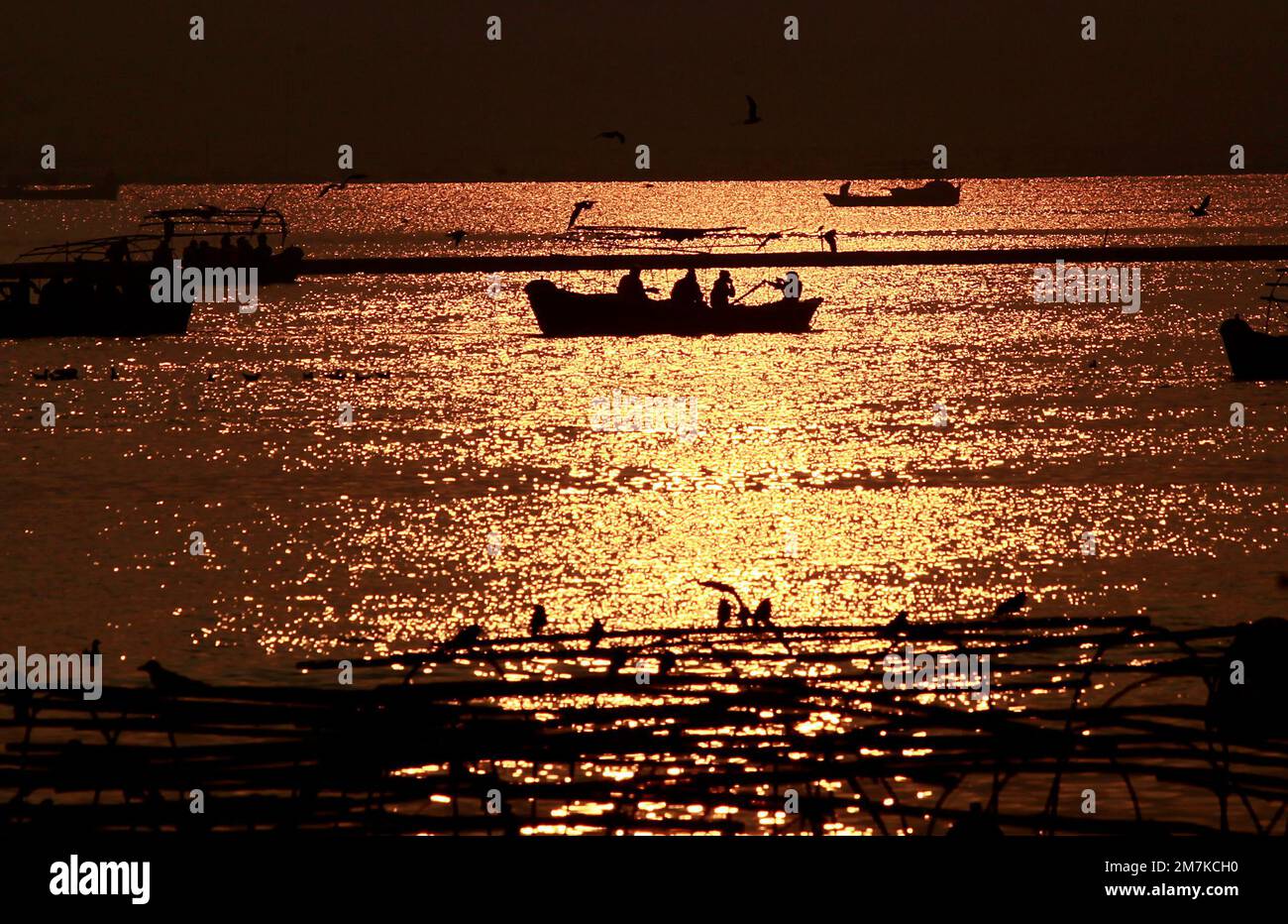 Prayagraj, India. 10th Jan, 2023. People enjoy boating at the bank of ...