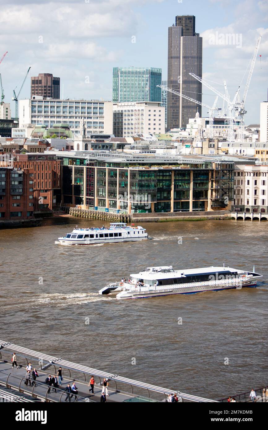 London River Thames Cruises. River boats taking tourists through the UK ...